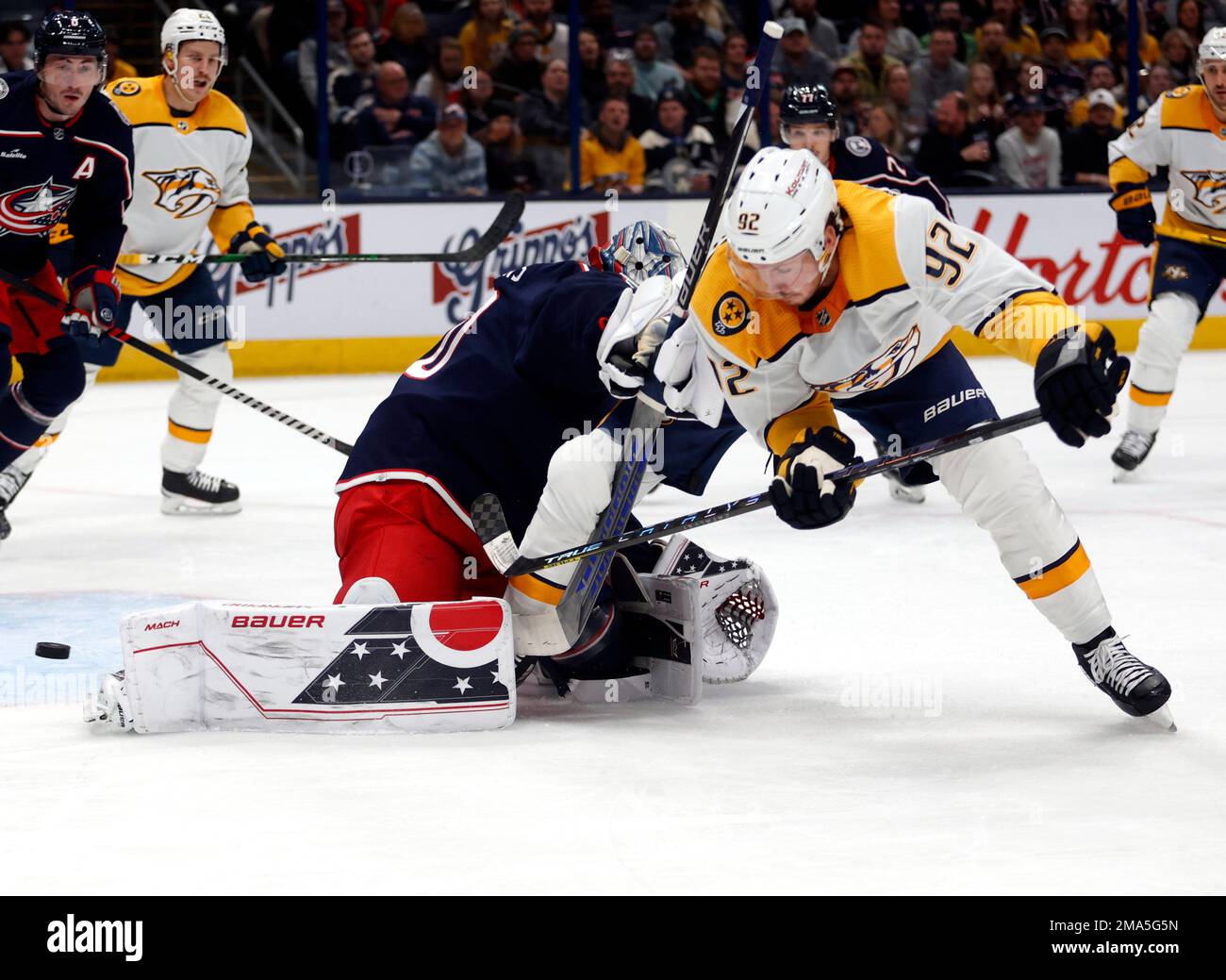 Nashville Predators forward Ryan Johansen, front right, scores past ...
