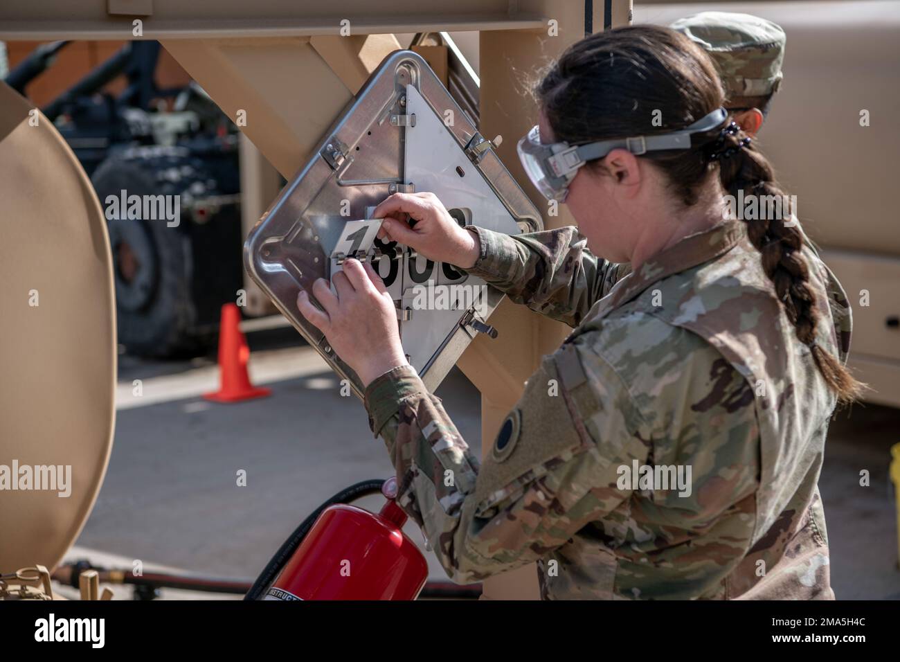 Sgt. Katherine Gross, a member of the Michigan National Guard, performs ...