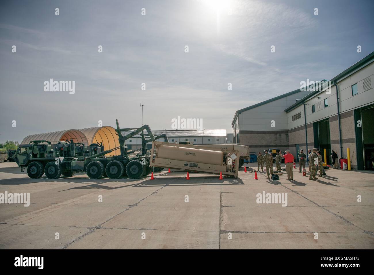 Members of the Michigan National Guard perform a fuel line flushing and ...