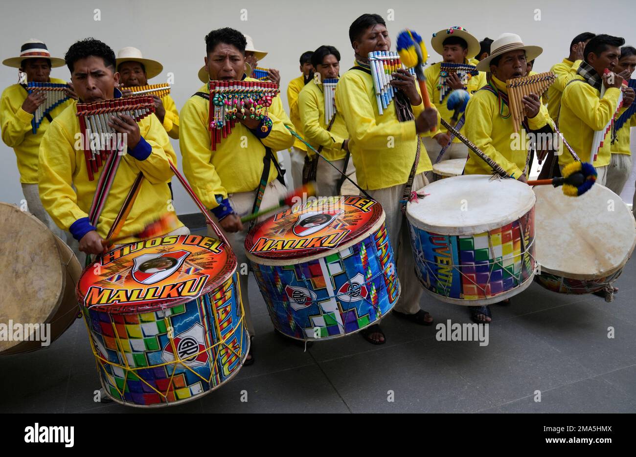 Quechua Indigenous musicians play "sikus," or windpipes, and drums ...