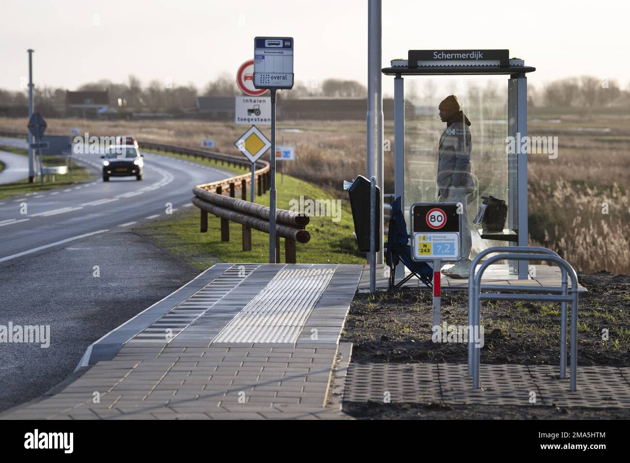 SCHERMERHORN - A man is waiting for the bus that never came. Thousands ...