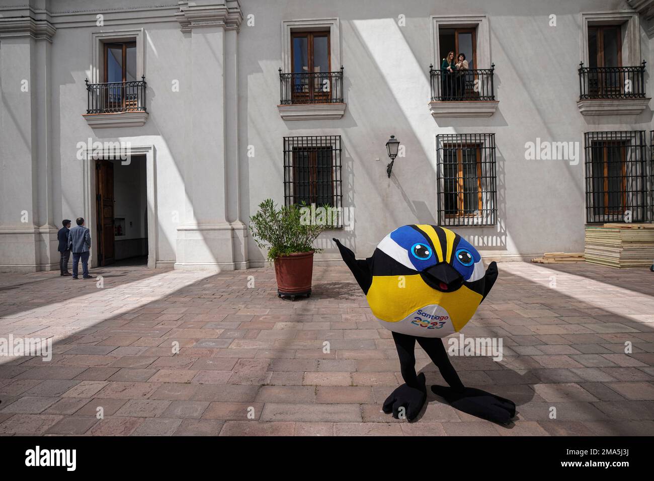 The Pan American Games mascot Fiu, a bird, poses for pictures at a ...