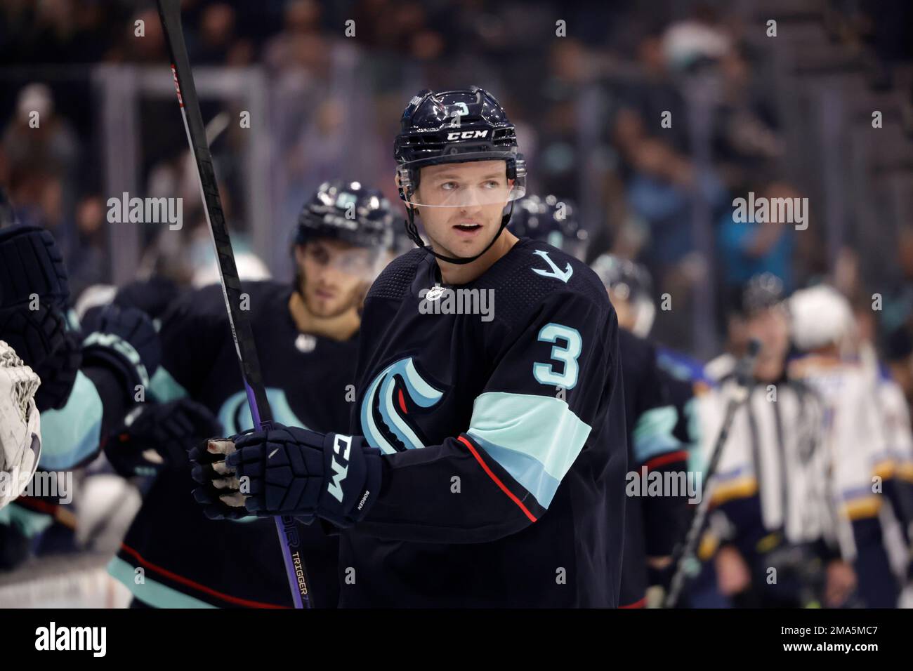 Seattle Kraken defenseman Will Borgen (3) is congratulated after ...