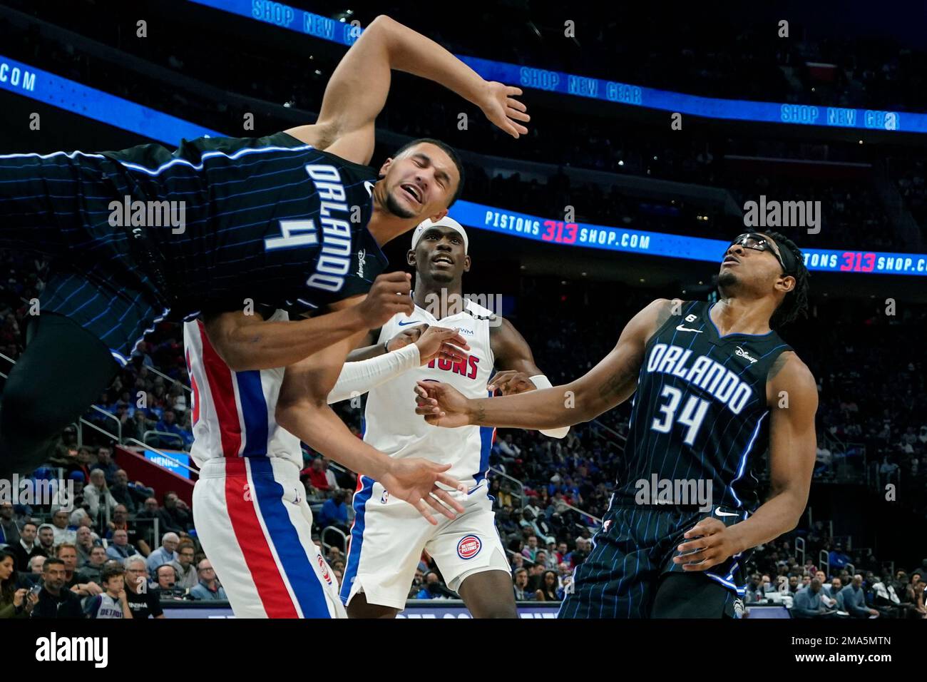 Orlando Magic guard Jalen Suggs (4) gets tangled up with Detroit ...