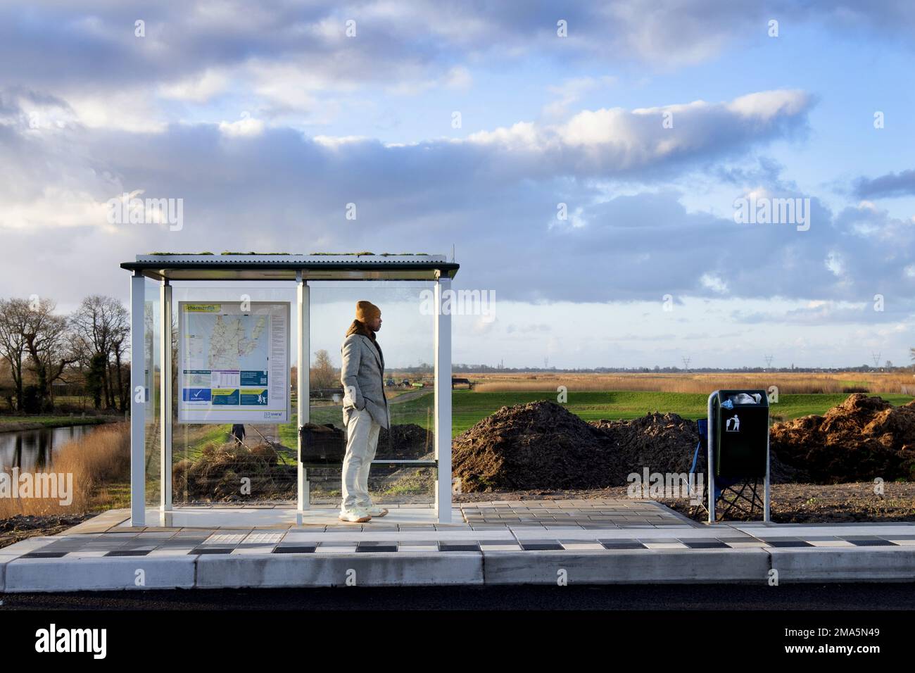 SCHERMERHORN - A man is waiting for the bus that never came. Thousands ...