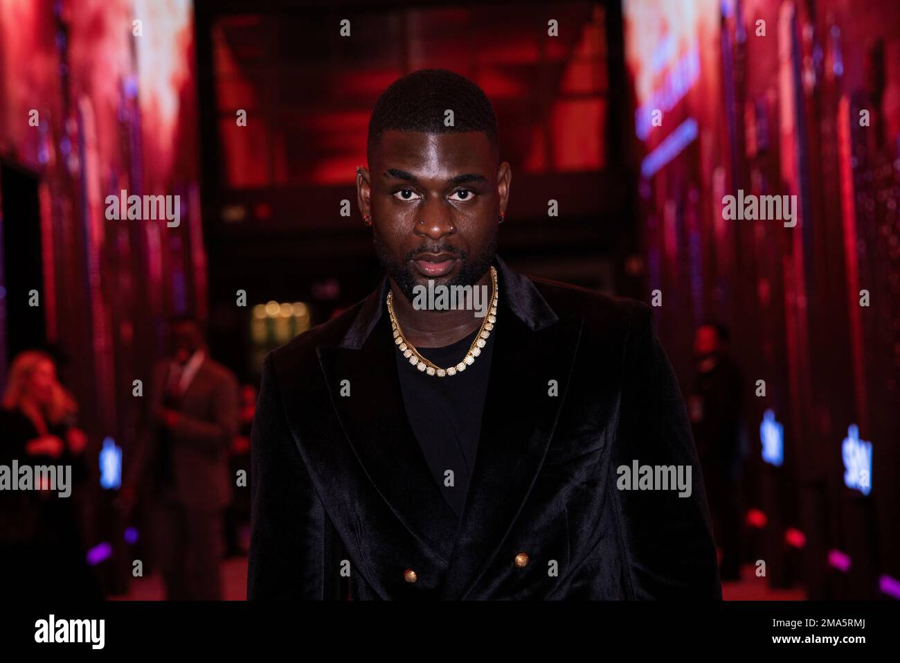 Dami Hope poses for photographers upon arrival for the premiere of the ...