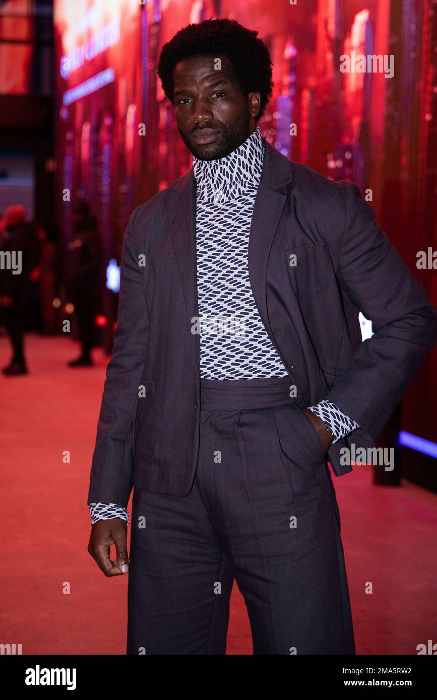 Sope Dirisu poses for photographers upon arrival for the premiere of ...