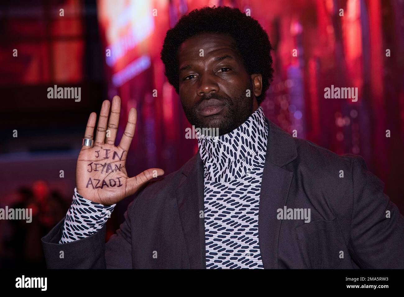 Sope Dirisu poses for photographers upon arrival for the premiere of ...