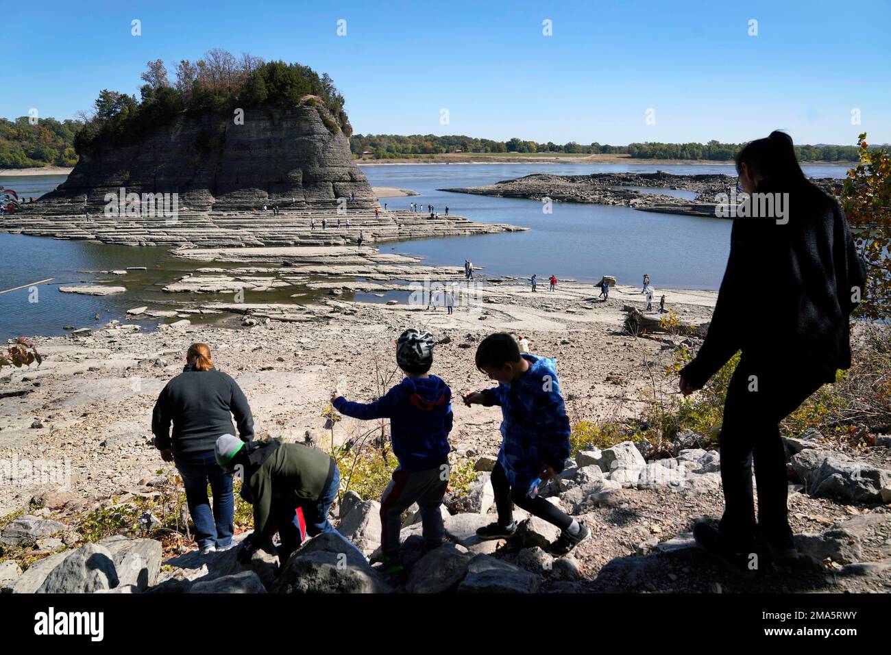 People walk toward Tower Rock to check out the attraction normally ...