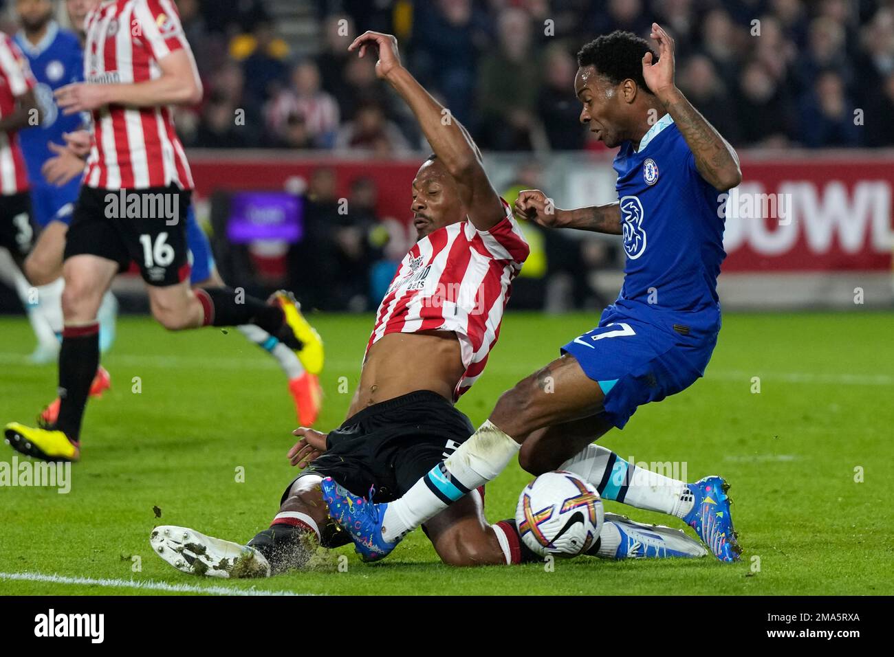 Brentford's Ethan Pinnock blocks a shot by Chelsea's Raheem Sterling ...