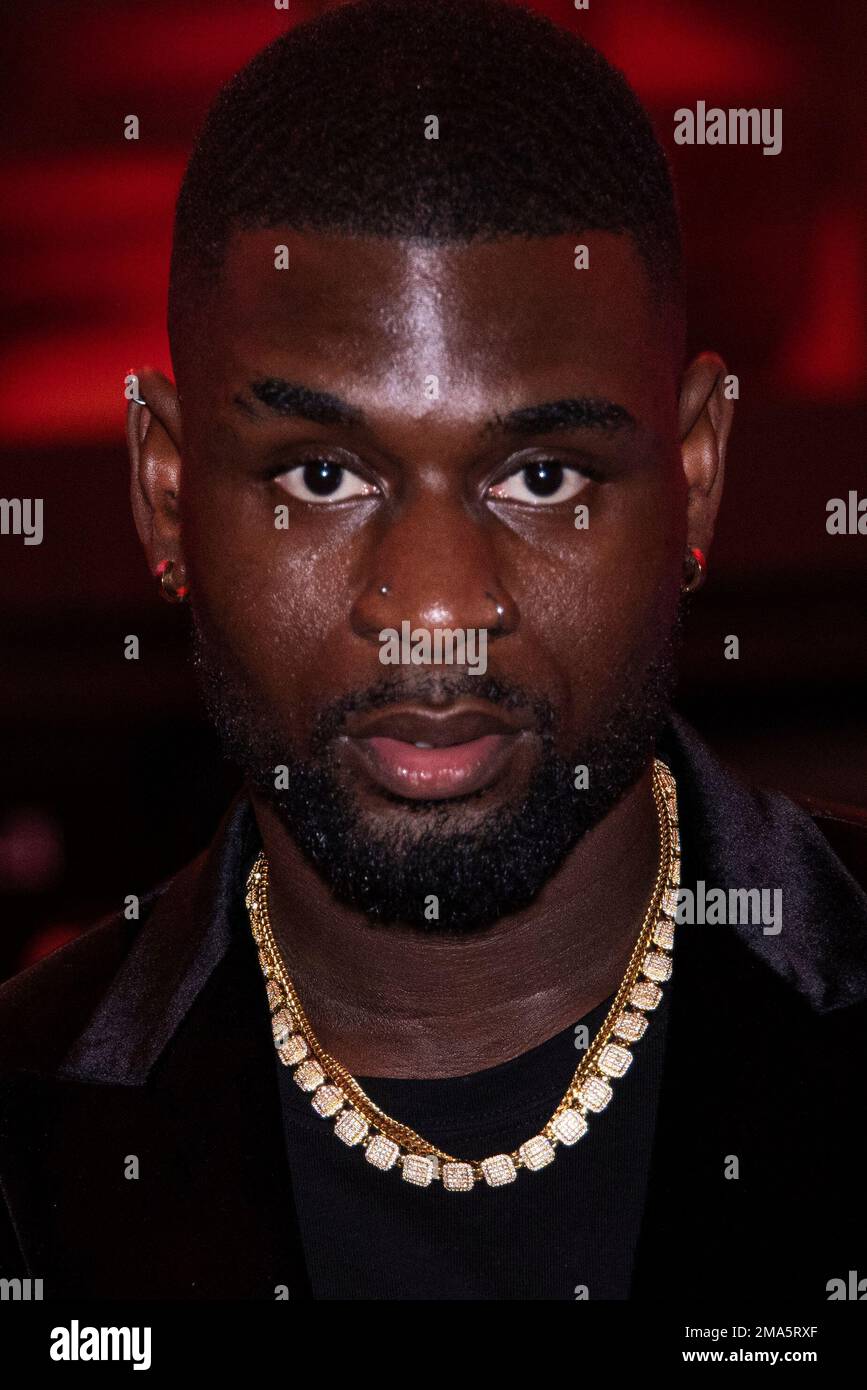 Dami Hope poses for photographers upon arrival for the premiere of the ...