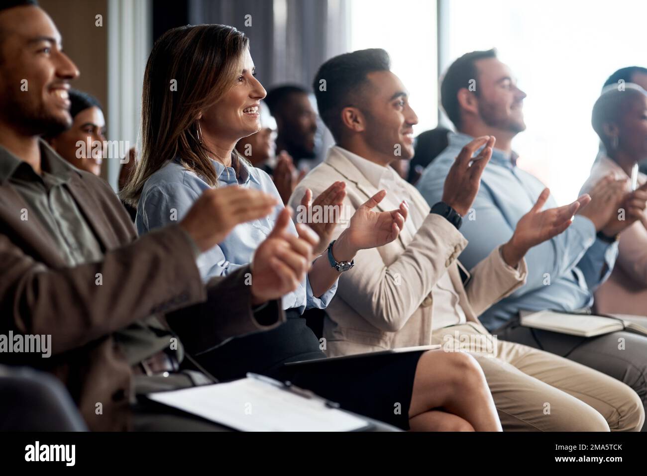 Winners applaud each other. a group of young businesspeople clapping ...