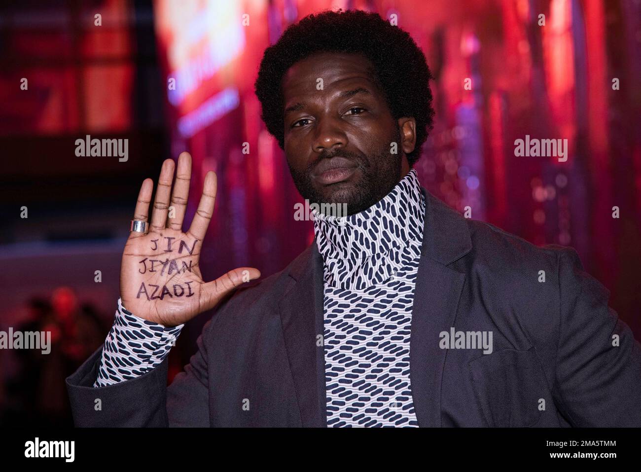 Sope Dirisu poses for photographers upon arrival for the premiere of ...