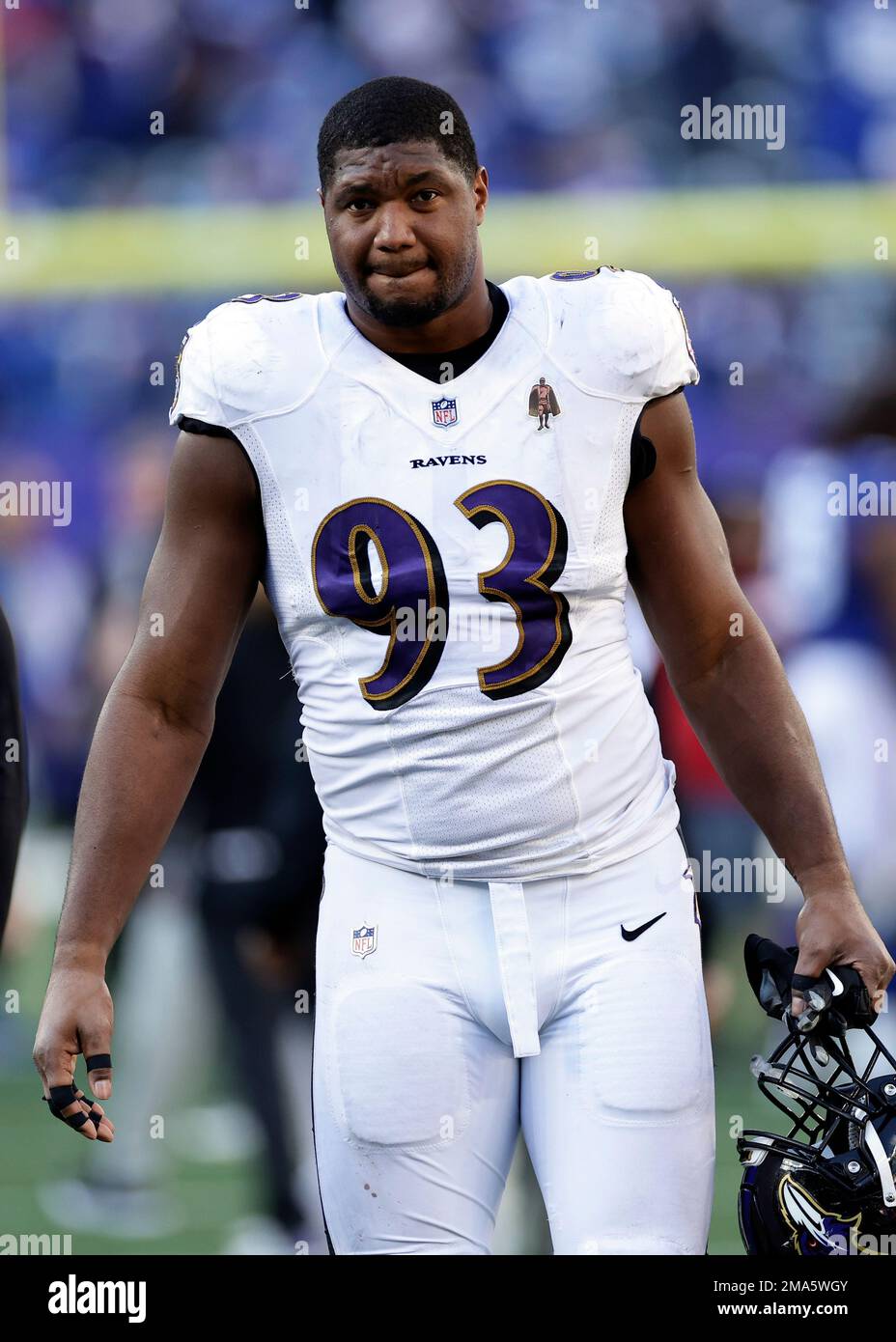 Baltimore Ravens defensive tackle Calais Campbell (93) walks off the ...
