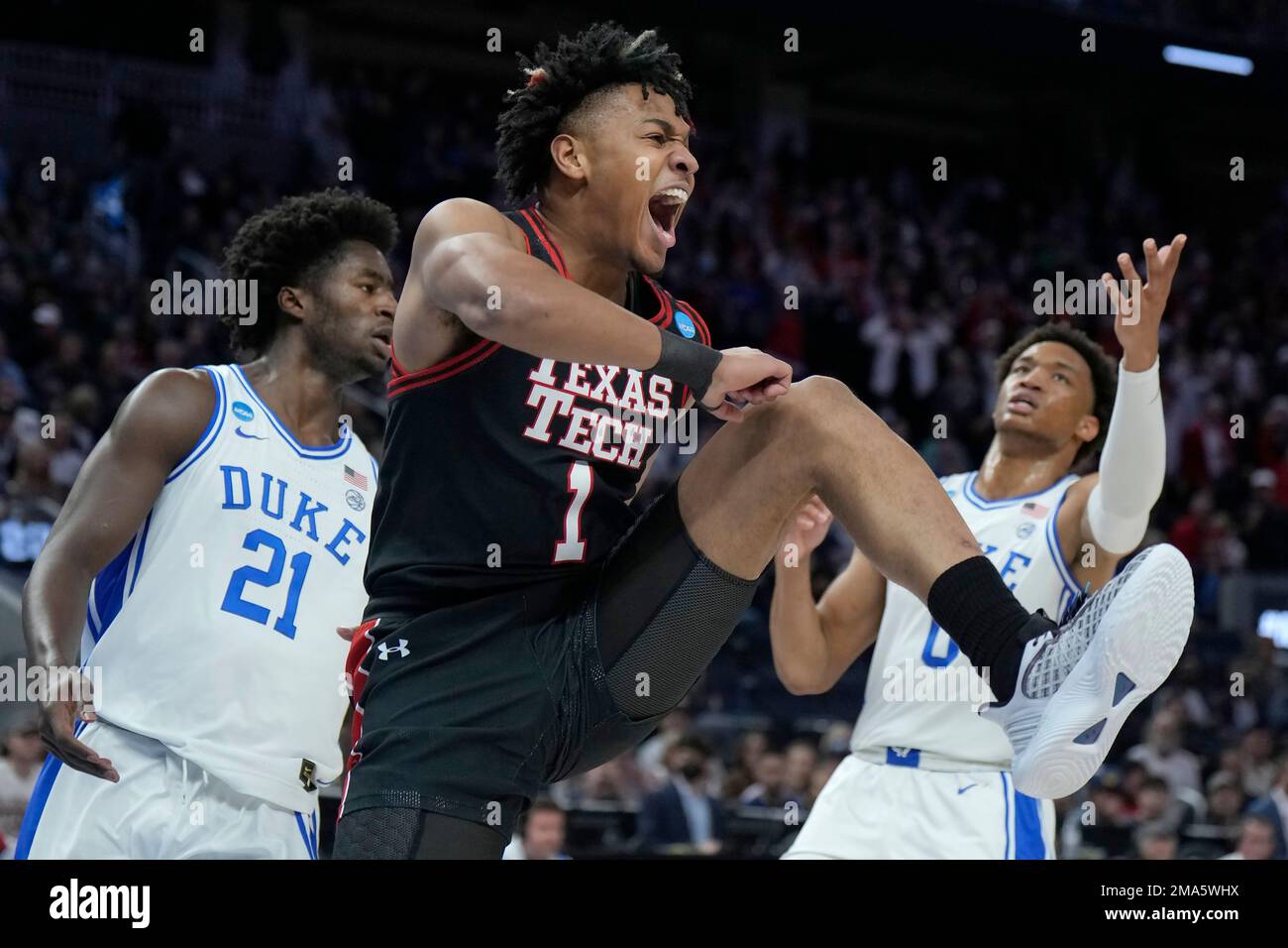 FILE - Texas Tech guard Terrence Shannon Jr. (1) reacts after dunking ...
