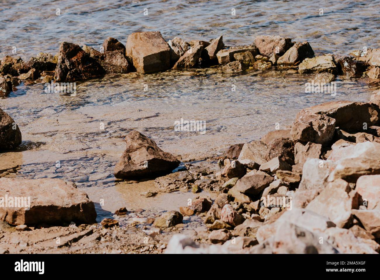 Summer coastline near an island on the deep blue ocean Stock Photo - Alamy