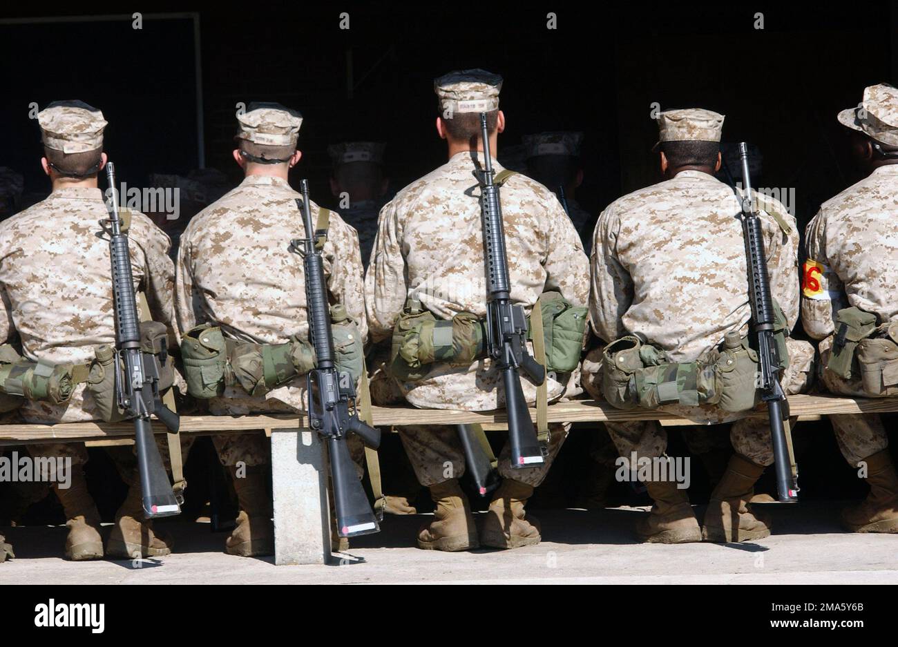 US Marine Corps (USMC) Recruits sling their 5.56mm M16A2 rifles while ...