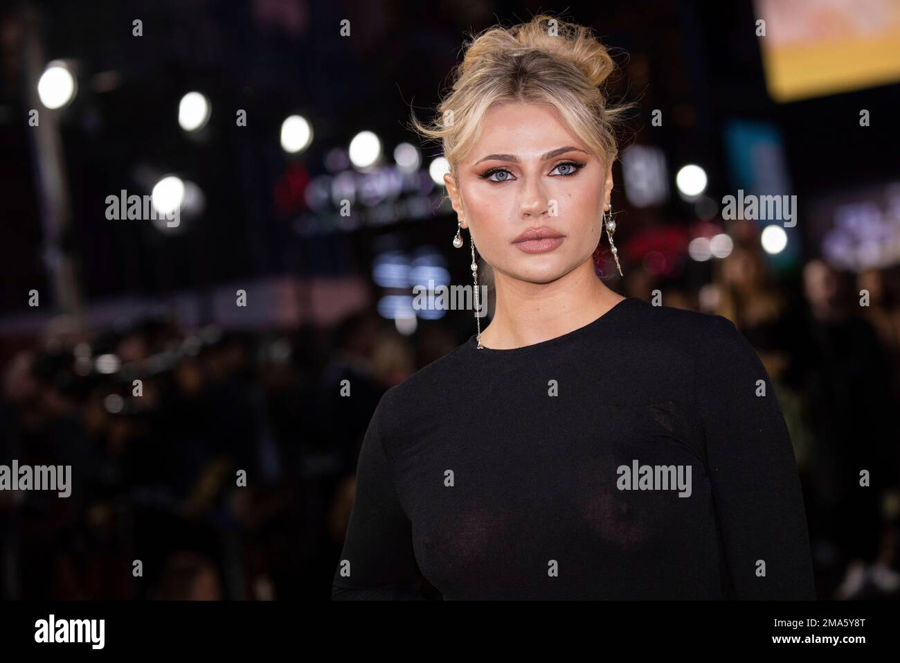 Molly Abbott poses for photographers upon arrival for the premiere of ...