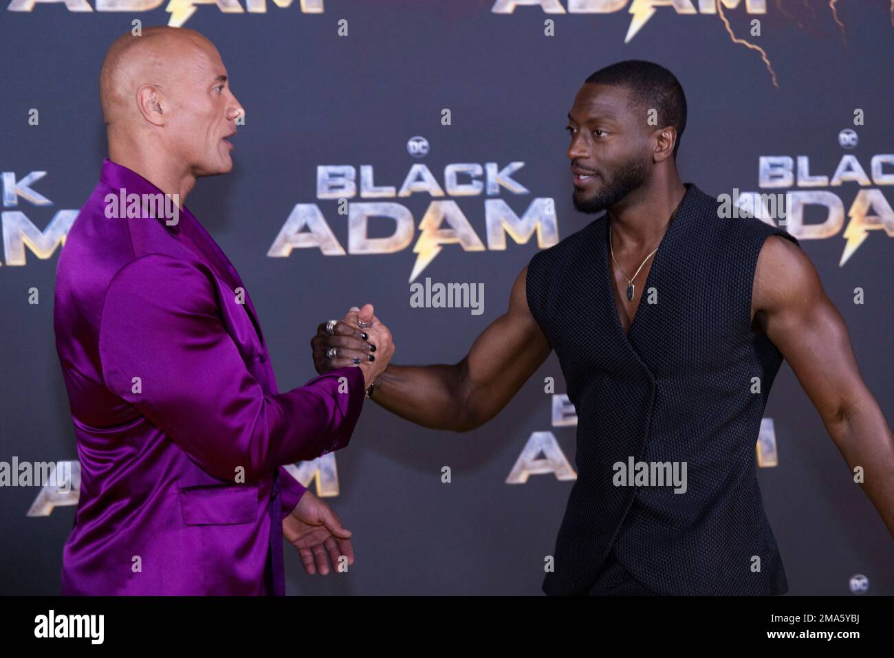 Dwayne Johnson a.k.a. The Rock, left, and Aldis Hodge pose for ...