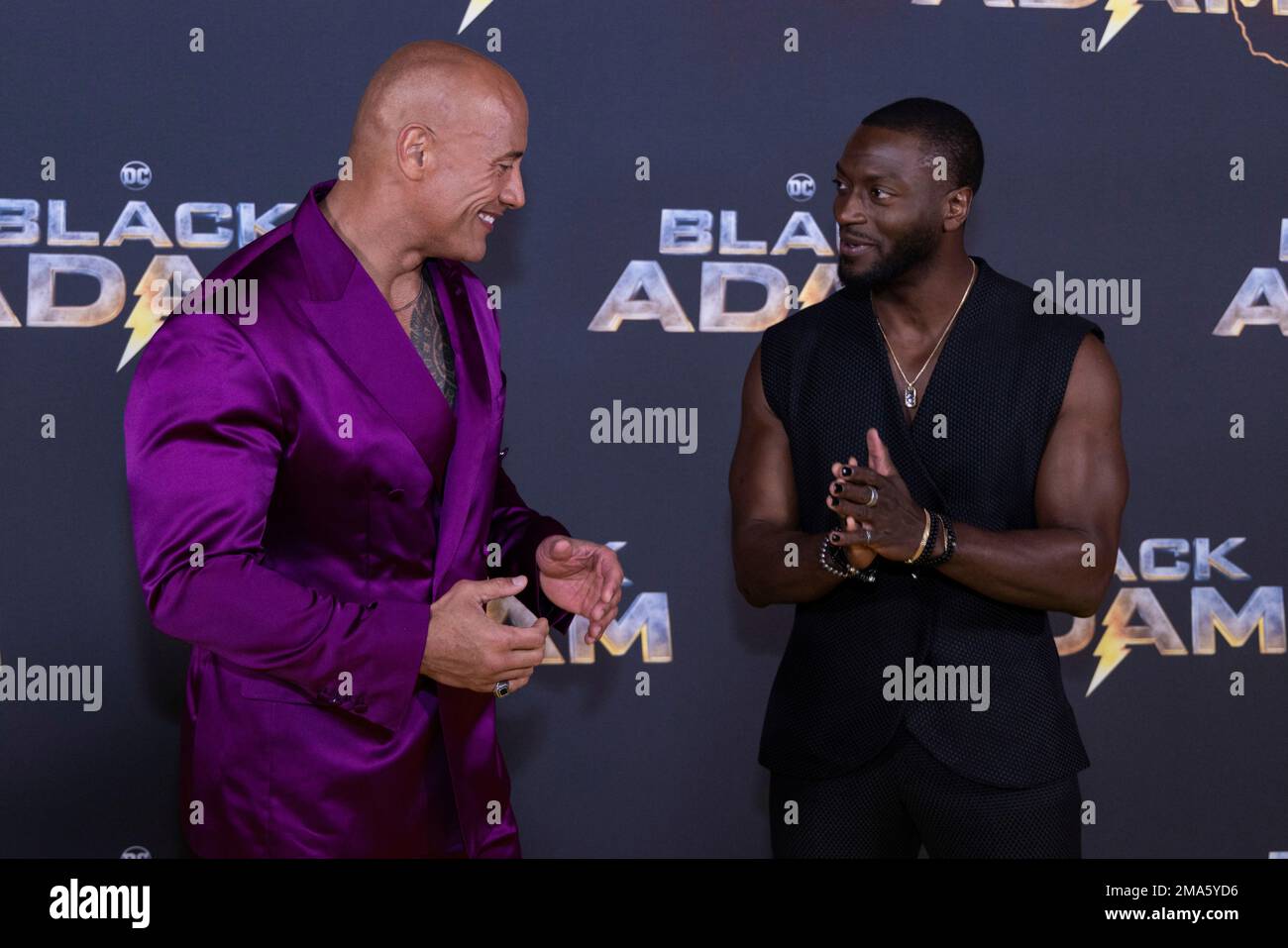 Dwayne Johnson a.k.a. The Rock, left, and Aldis Hodge pose for ...