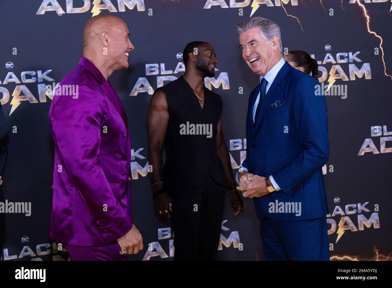 Dwayne Johnson a.k.a. The Rock, left, and Pierce Brosnan poses for ...