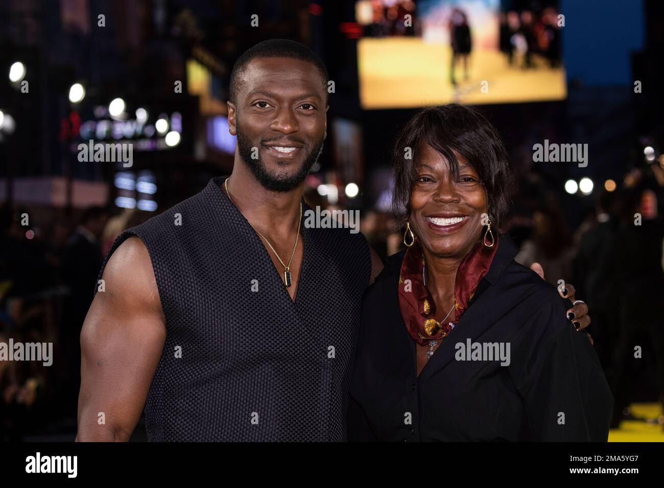 Aldis Hodge and Yolette Evangeline Richardson pose for photographers ...