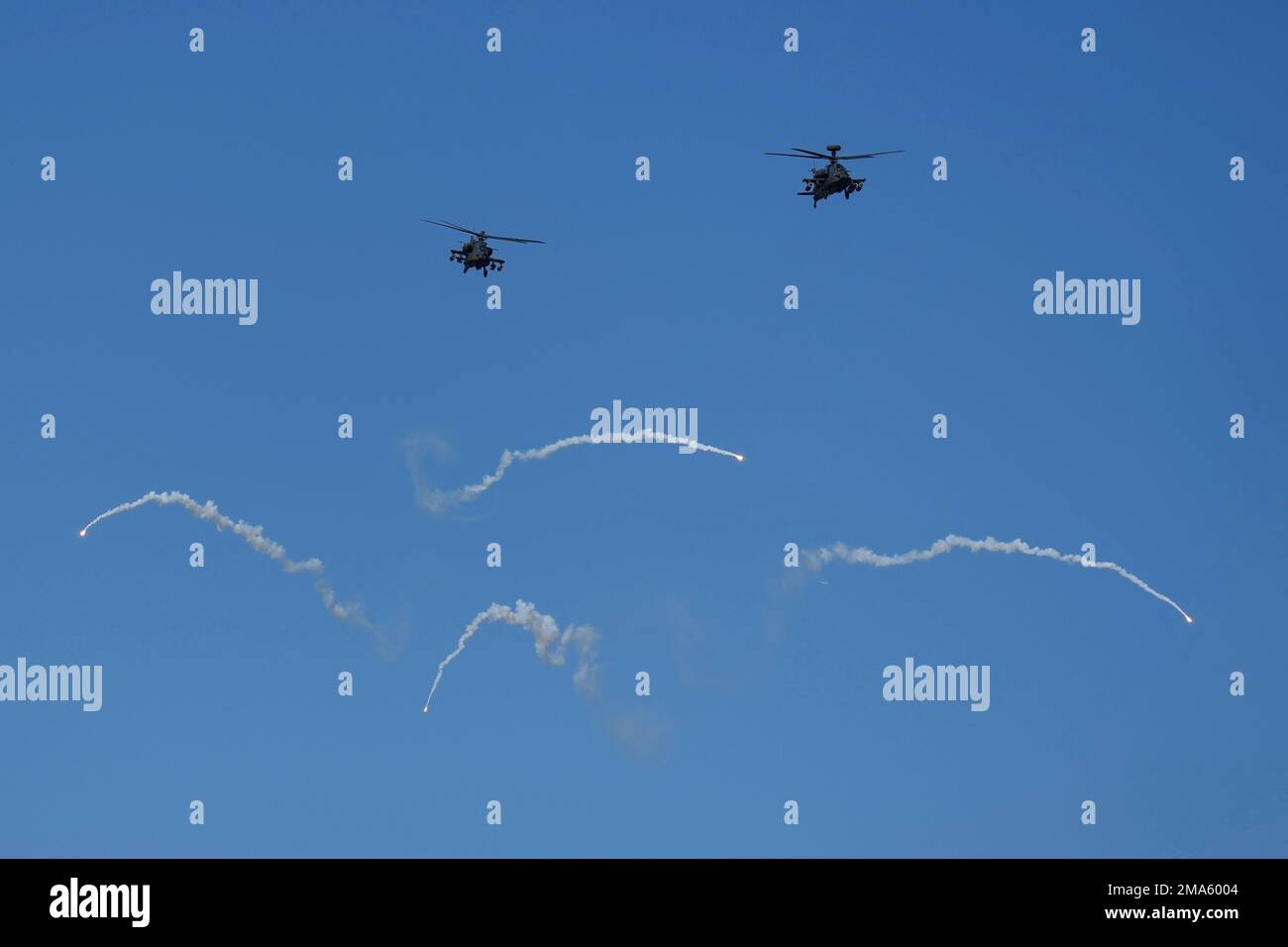 South Korean army's Apache helicopters fire flare shells during a joint ...