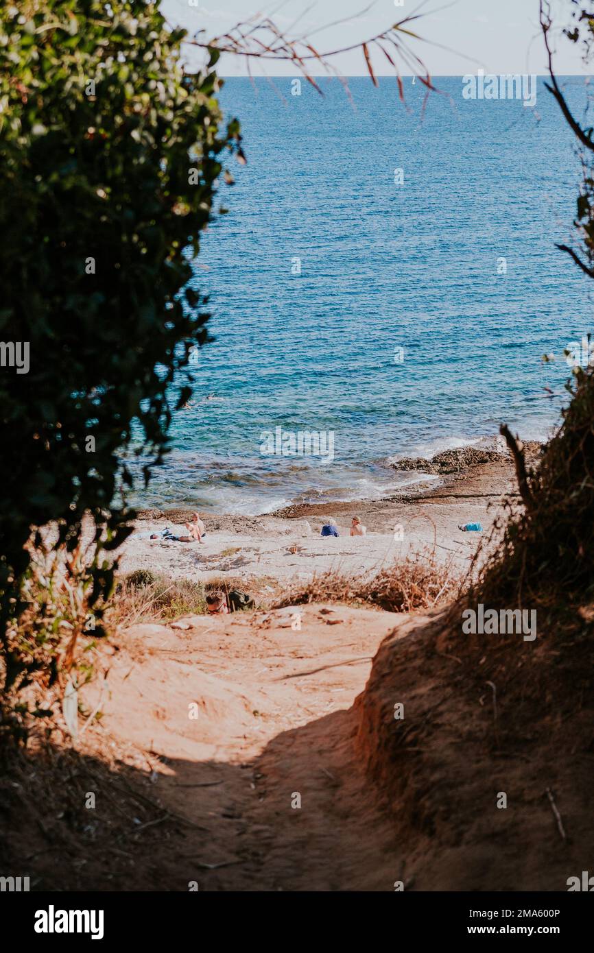 Summer coastline near an island on the deep blue ocean Stock Photo - Alamy