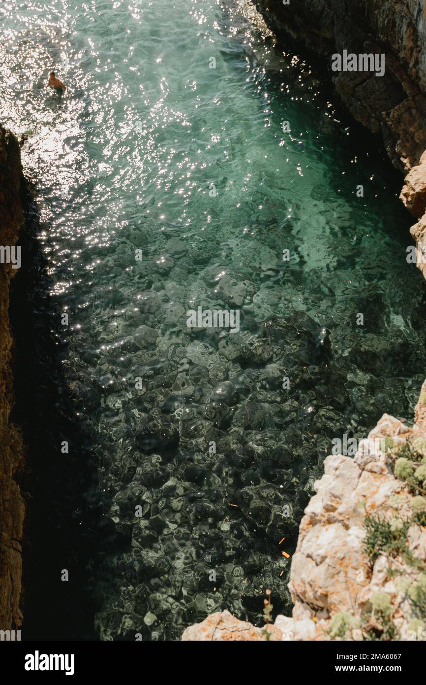 Summer coastline near an island on the deep blue ocean Stock Photo - Alamy