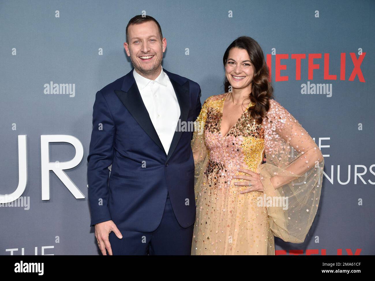 Director Tobias Lindholm, left, and wife Caroline Blanco attend the ...