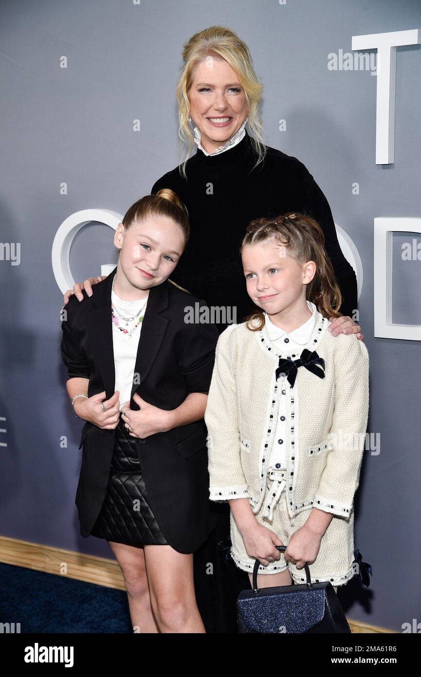 Real life subject of the film Amy Loughren, center, poses with actors ...