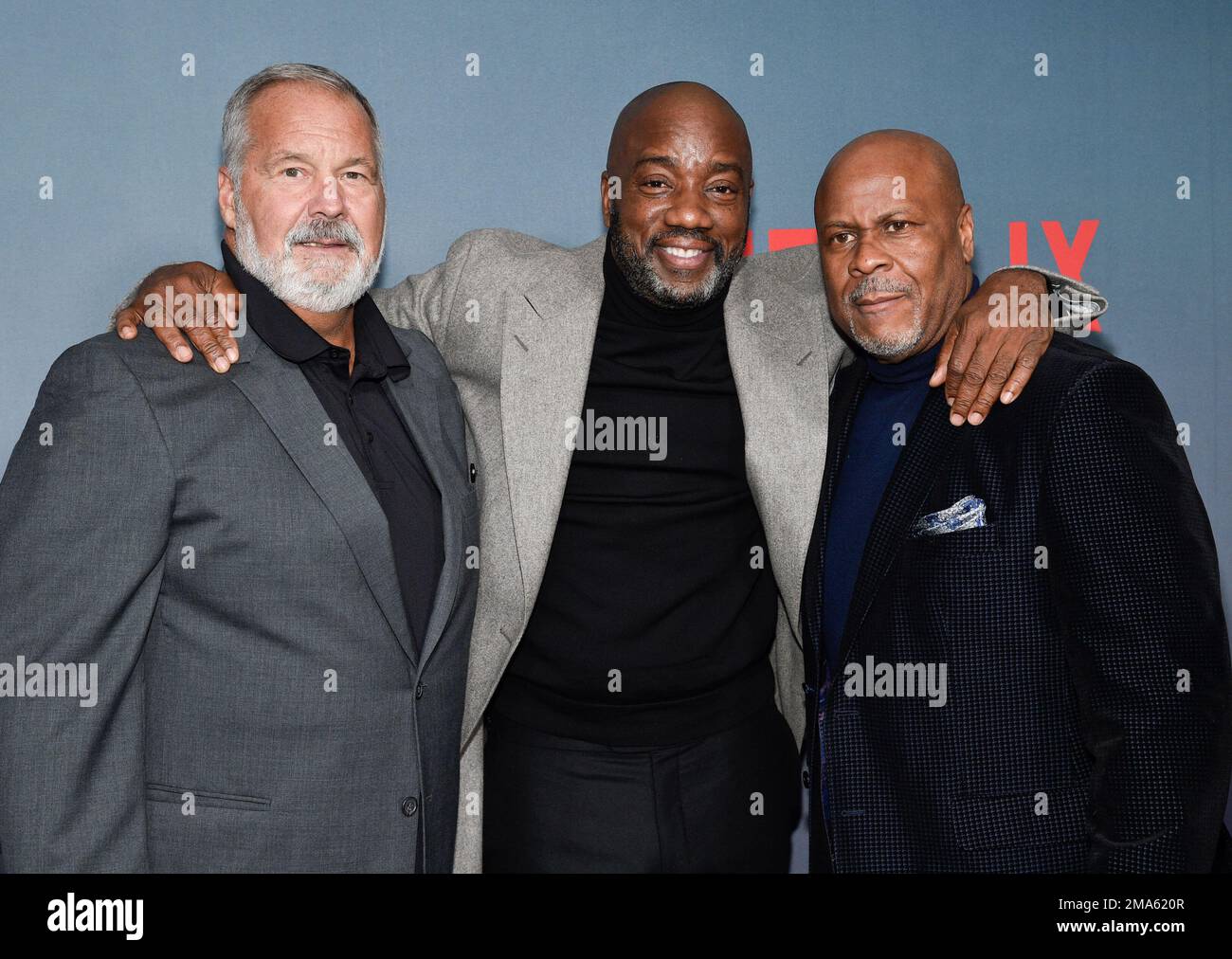 Actor Malik Yoba, center, poses with real life subjects of the film ...