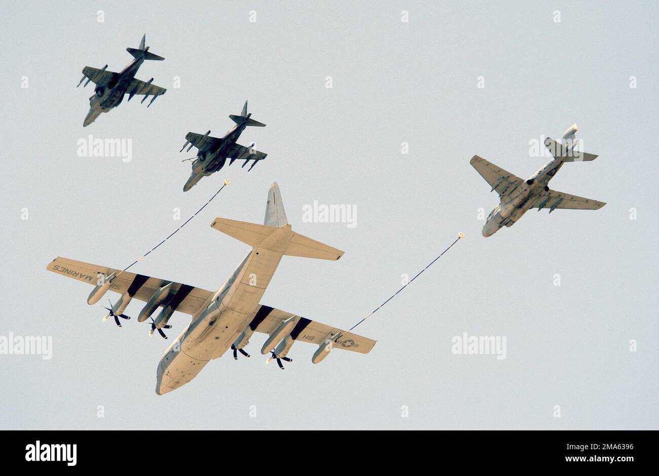A US Marine Corps (USMC) KC-130J Hercules aircraft simulates aerial ...
