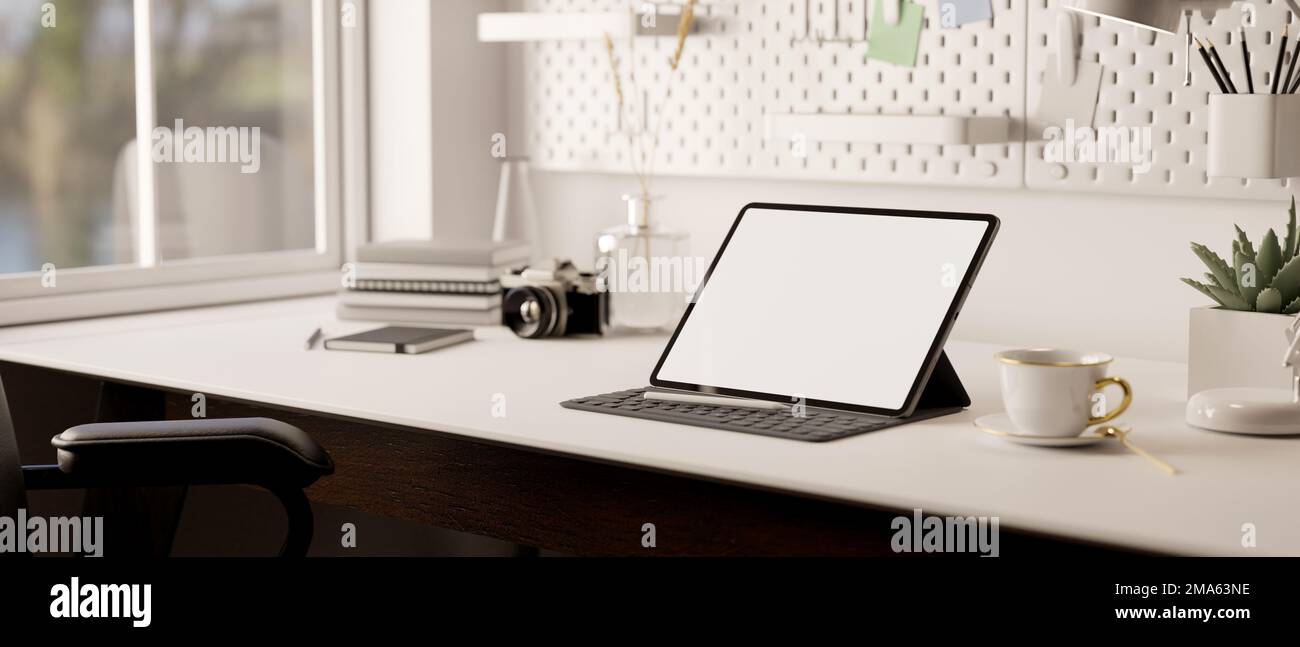 Portable digital tablet white screen mockup with wireless keyboard is ...