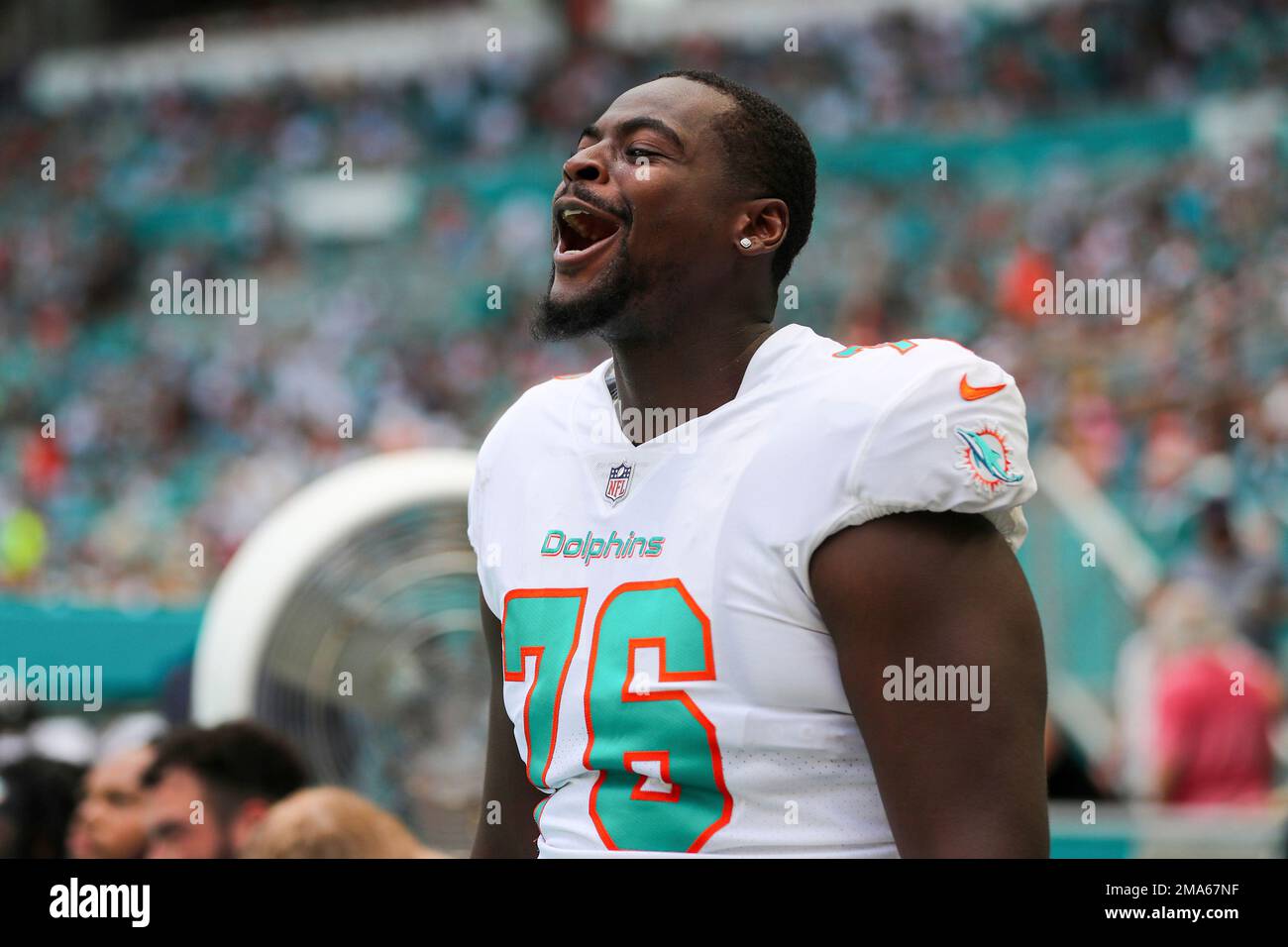 Miami Dolphins offensive tackle Kion Smith (76) cheers during a NFL ...