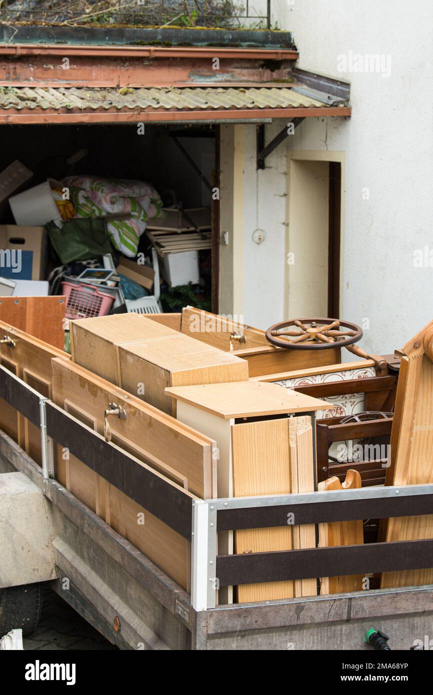 Car trailer with bulky waste Stock Photo - Alamy