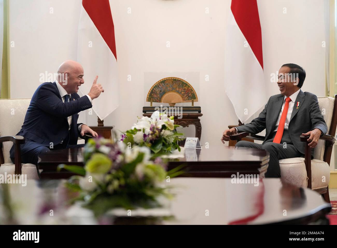 Indonesian President Joko Widodo, right, talks with FIFA President ...