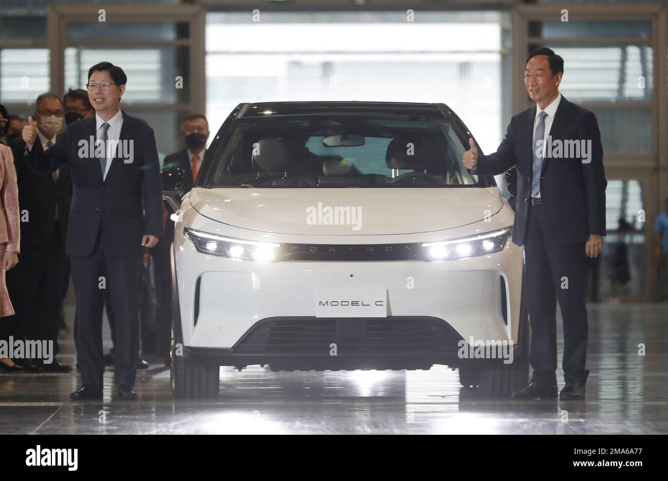 Foxconn founder Terry Gou, right, and chairman Young Liu pose with the ...