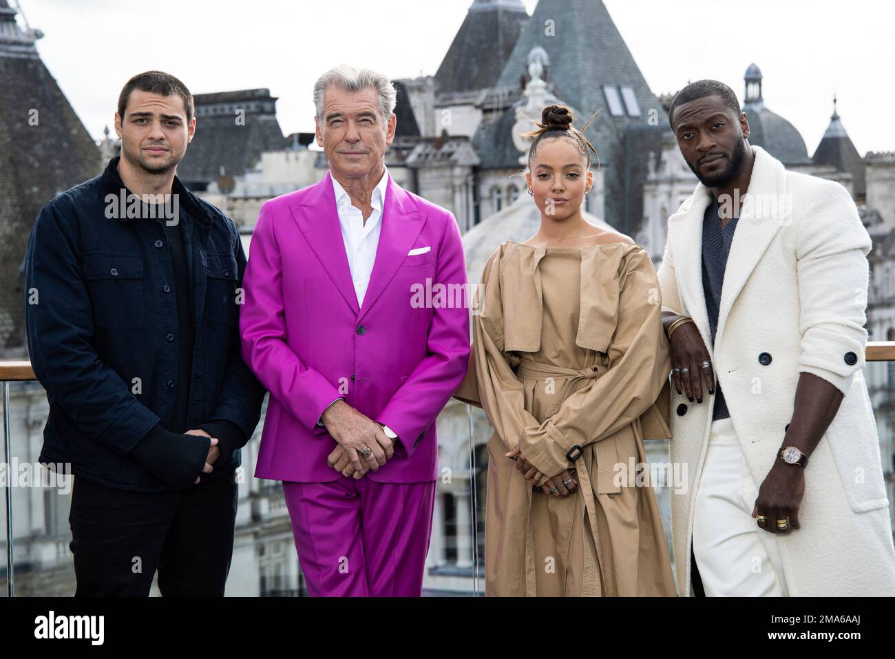 Noah Centineo, Pierce Brosnan, Quintessa Swindell and Aldis Hodge pose ...