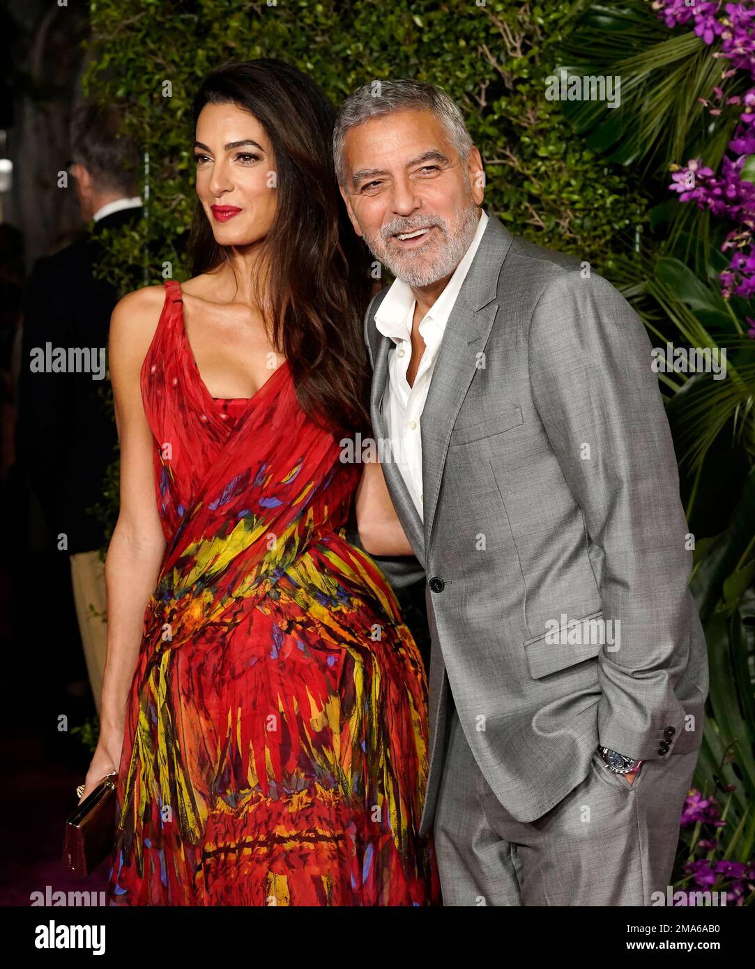 George Clooney poses with his wife Amal at the premiere of the film ...