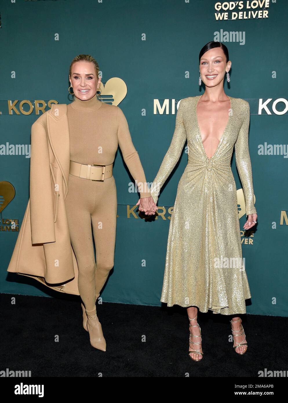 Yolanda Hadid, left, and Bella Hadid attend the God's Love We Deliver ...