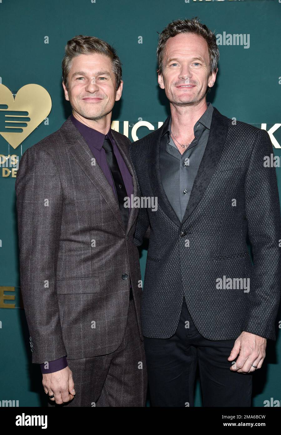 David Burtka, left, and husband Neil Patrick Harris attend the God's ...