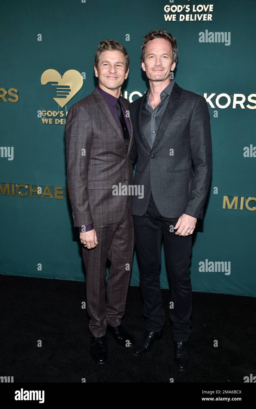 David Burtka, left, and husband Neil Patrick Harris attend the God's ...
