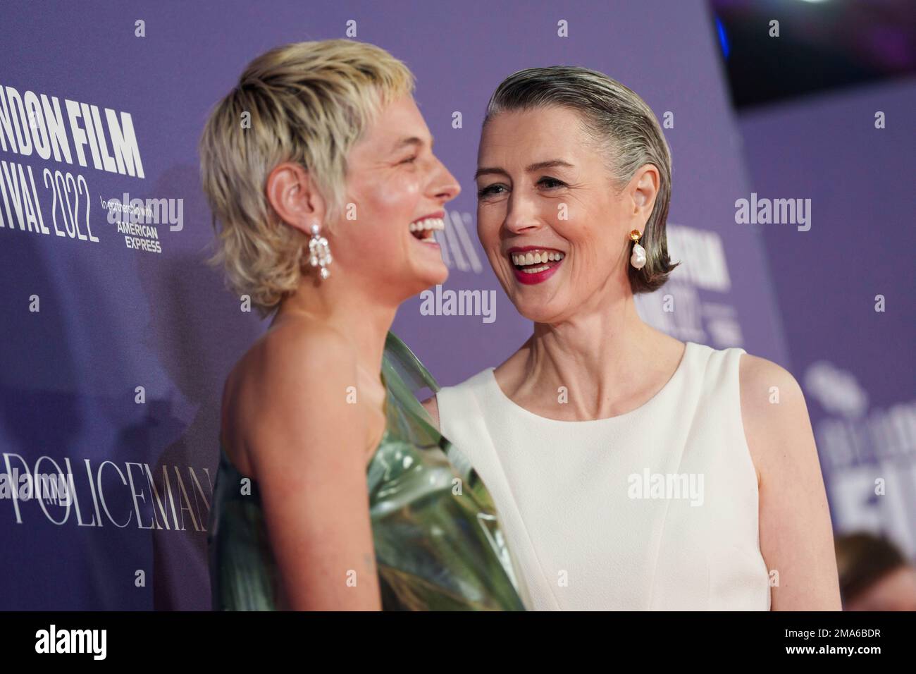 Gina McKee, left and Emma Corrin pose for photographers upon arrival ...