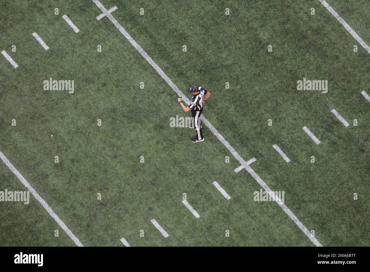 Aerial view of back judge Matt Edwards (96) checking his watch during ...