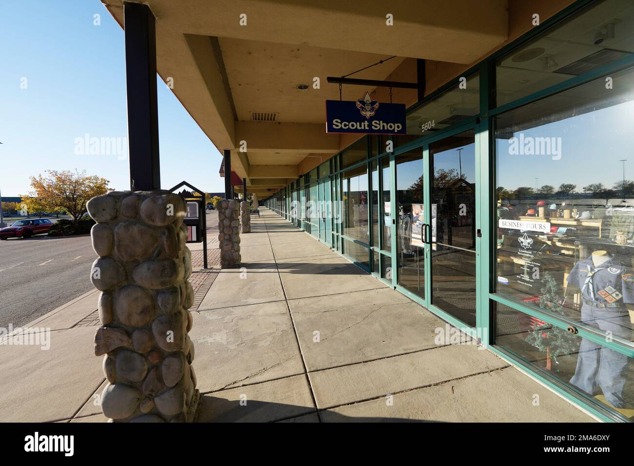 Empty walks pass by empty storefronts in the Outlets at Loveland Monday ...
