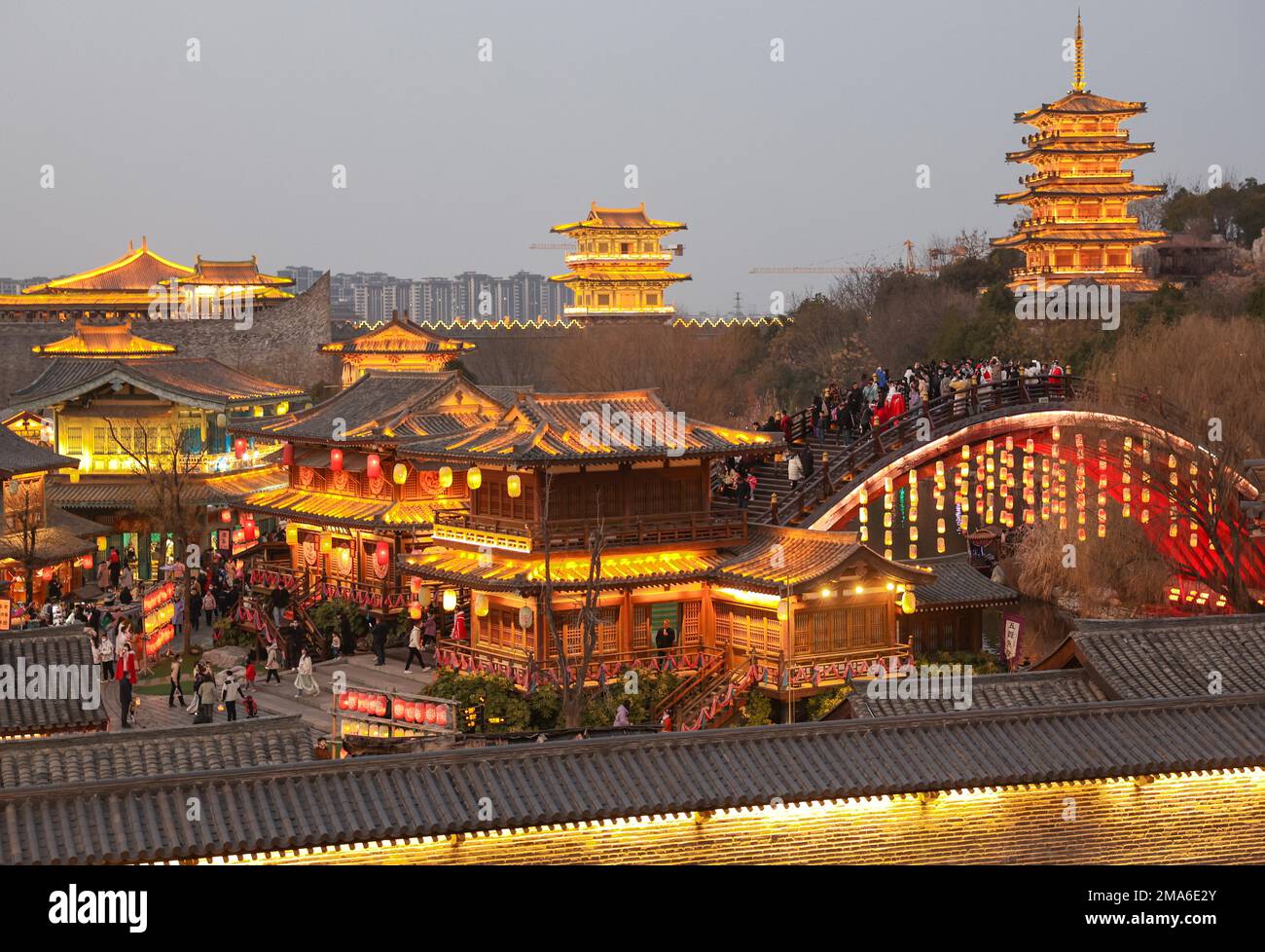 Aerial photo shows the night view of the illuminated Tangcheng scenic ...
