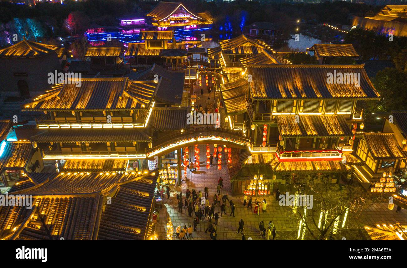 Aerial photo shows the night view of the illuminated Tangcheng scenic ...