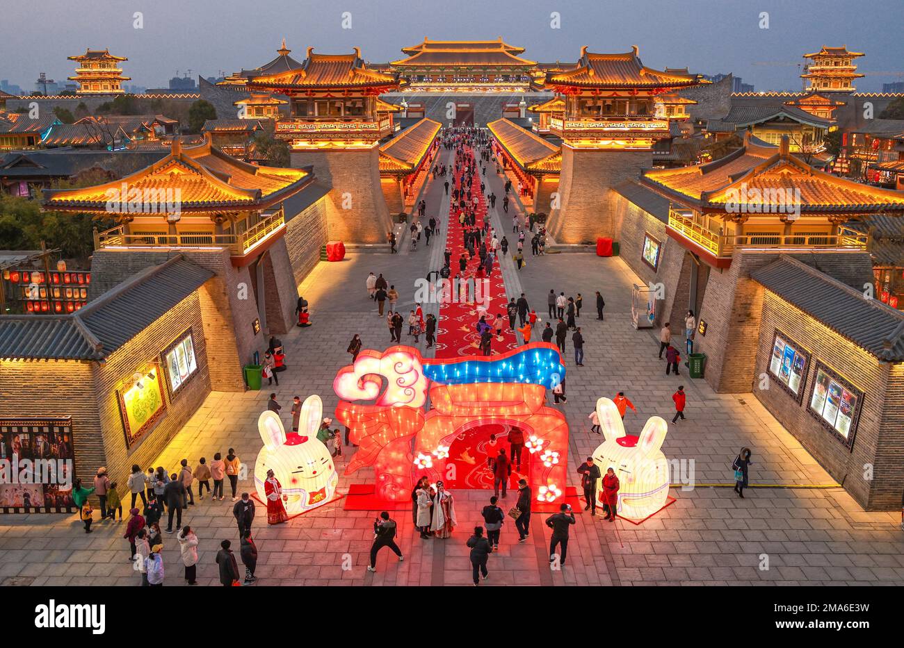 Aerial photo shows the night view of the illuminated Tangcheng scenic ...