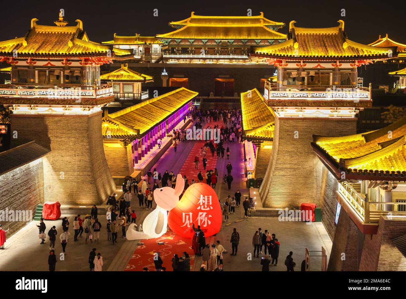 Aerial photo shows the night view of the illuminated Tangcheng scenic ...